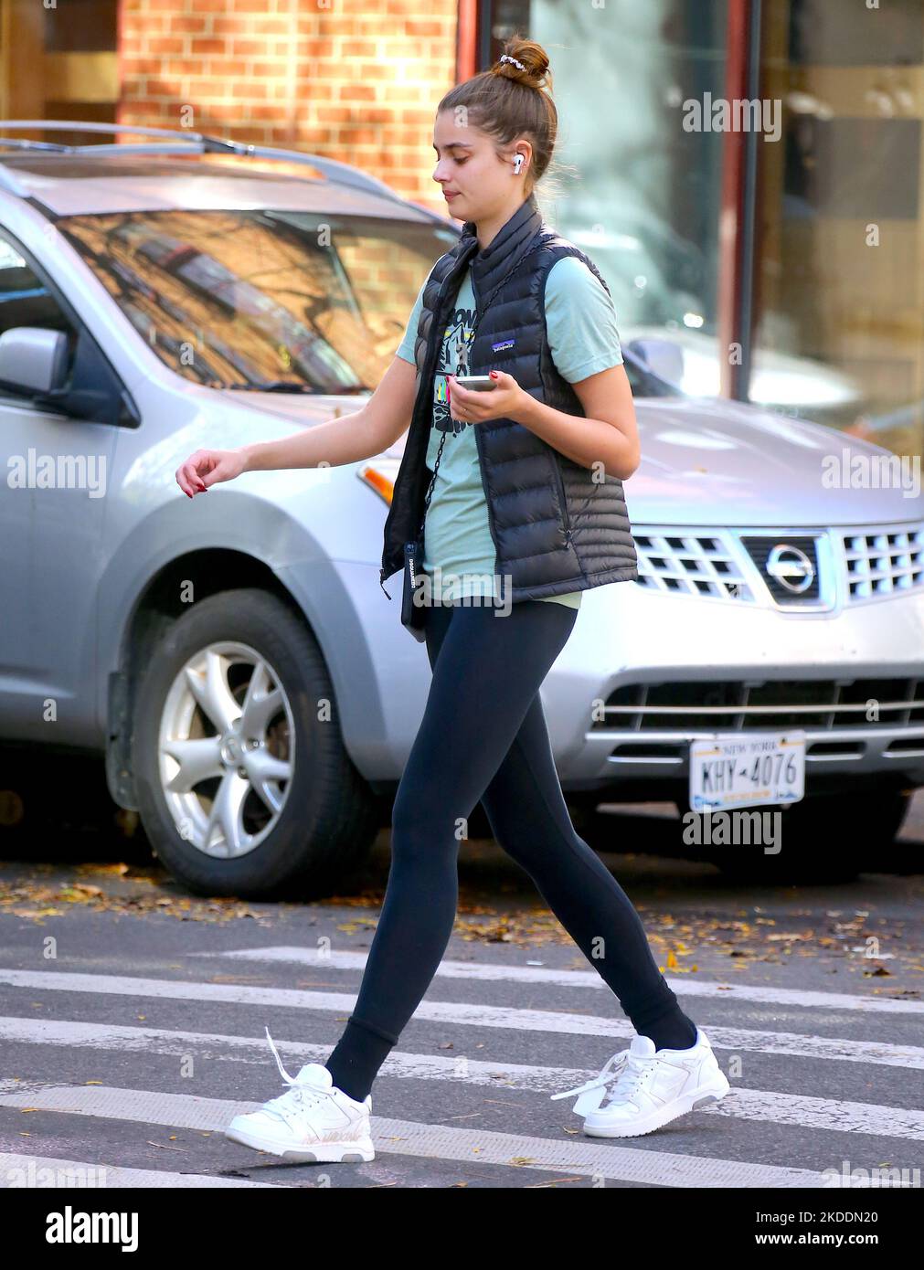 Model Taylor Hill walking early in the morining on Sixth Avenue in Soho ...