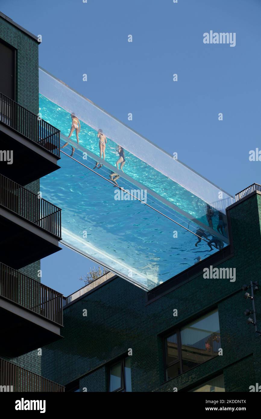 Swimmers hang in space at the Sky Pool, Embassy Gardens, Battersea ...