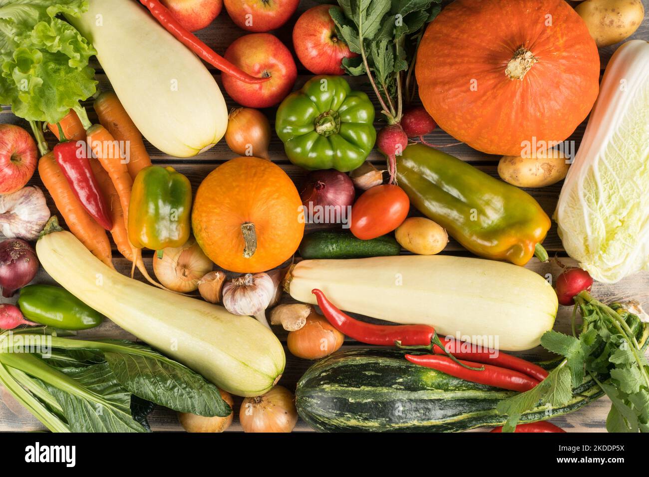 Multi composition of fresh farm vegetables and fruits, top view. Table ...