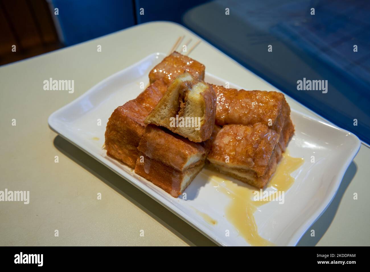 A plate of sweet and golden Hong Kong-style West Toast Bread Stock ...