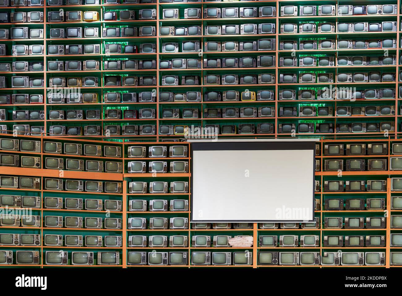 Old retro CRT TVs all over the wall Stock Photo - Alamy