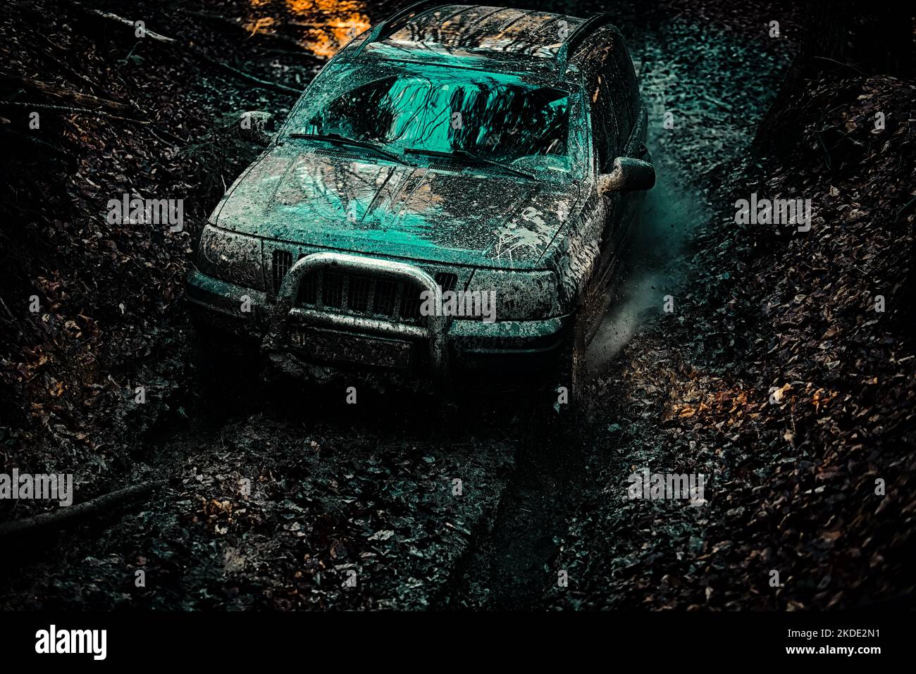 Off the road travel on mountain road. Track on mud. 4x4 Off-road suv ...