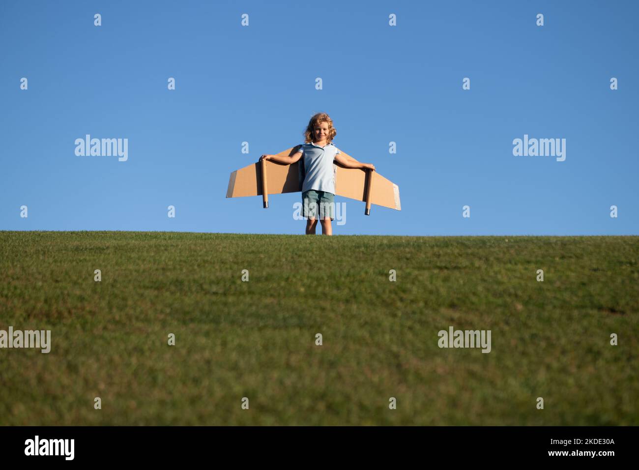 Child playing with toy jetpack. Child pilot astronaut or spaceman ...