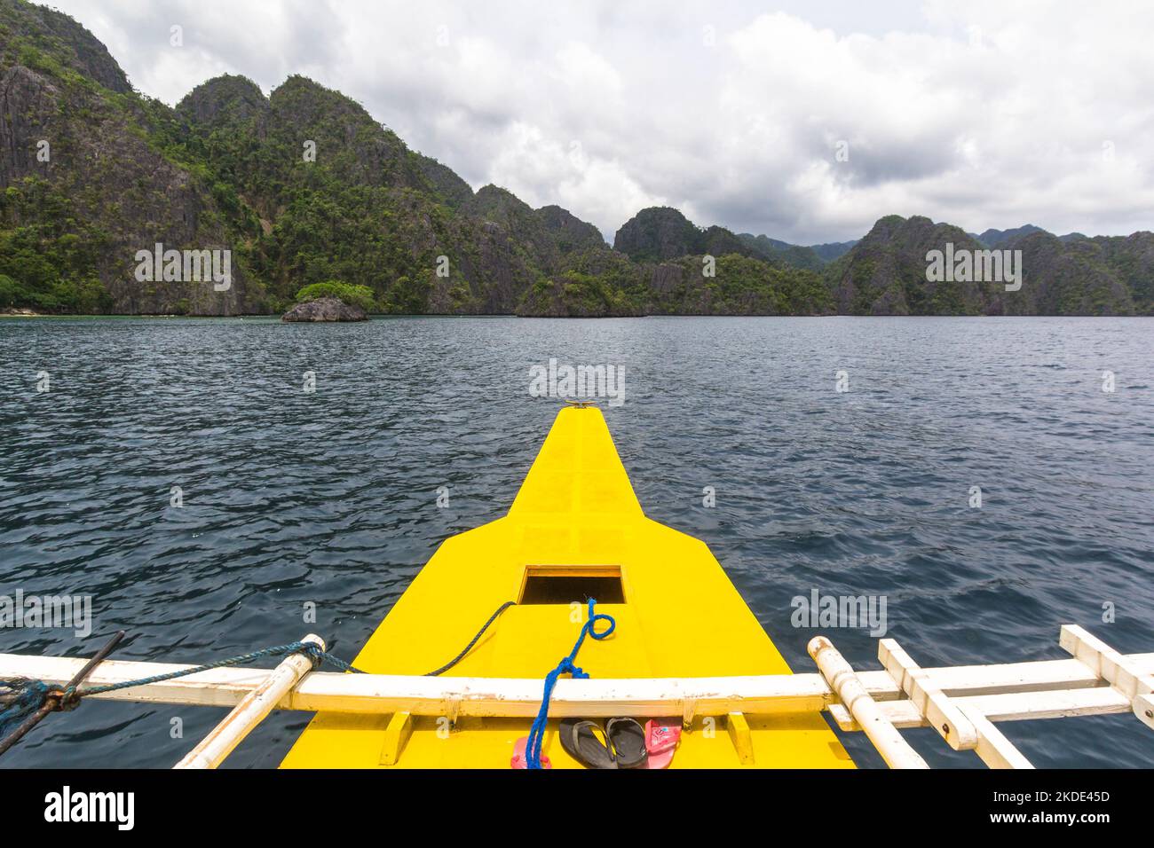 On a motorized outrigger boat heading to an island in northern Palawan ...