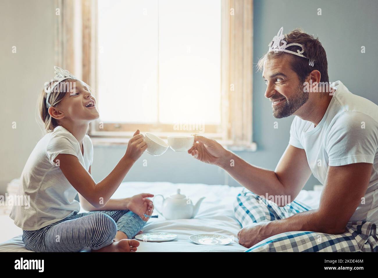 Living the Royal lifestyle. a father and daughter having a tea party at ...