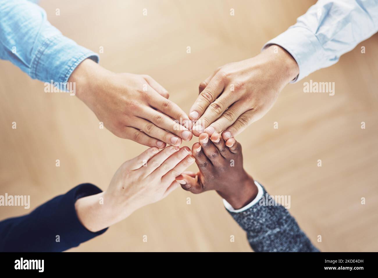 Work as one, get it done. High angle shot of a group of unidentifiable ...
