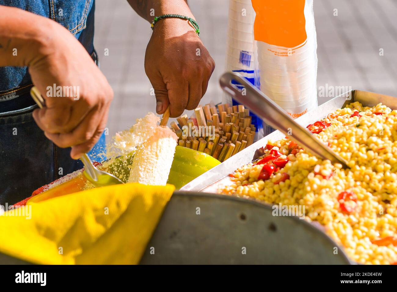 Close up hand adding corn hi-res stock photography and images - Alamy