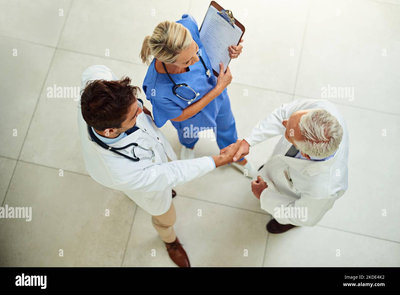 Bringing in an expert opinion. High angle shot of a team of doctors ...
