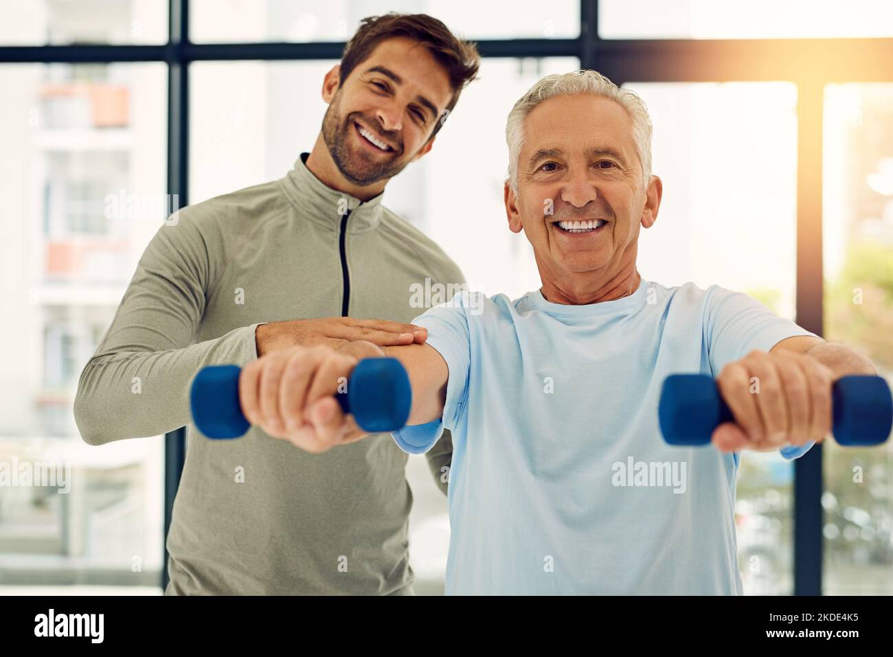 Fitness is easy when you have the right help. Portrait of a friendly ...