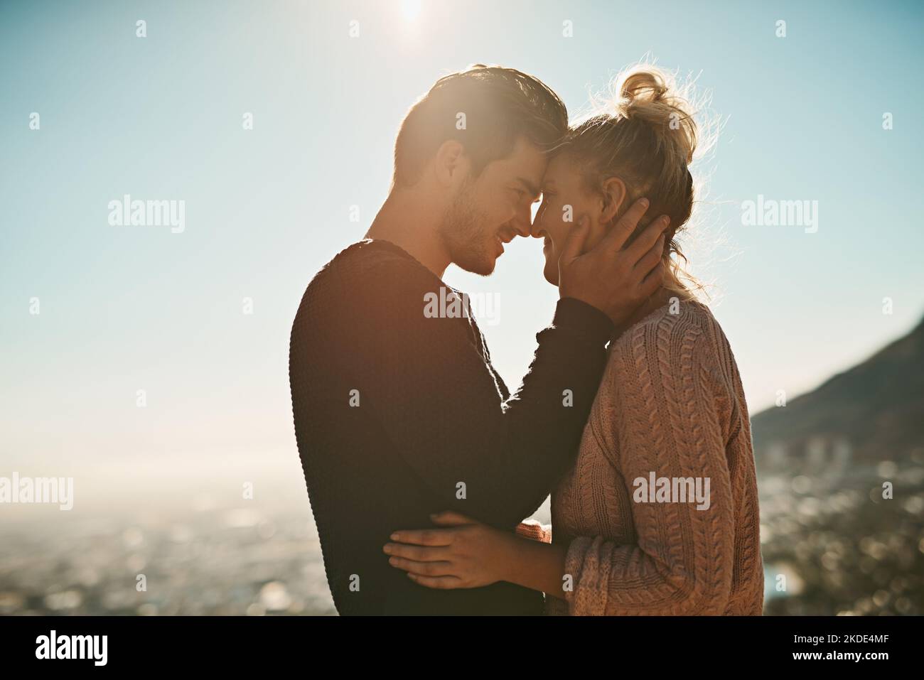 You mean everything to me. an affectionate couple on a mountain top ...