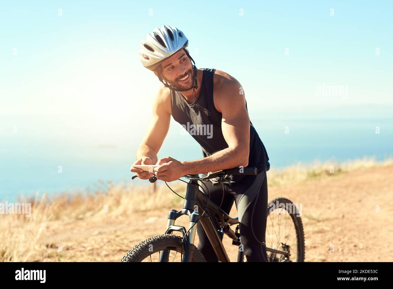 Mountain biking keeps me fit. a male cyclist out for a ride on his ...
