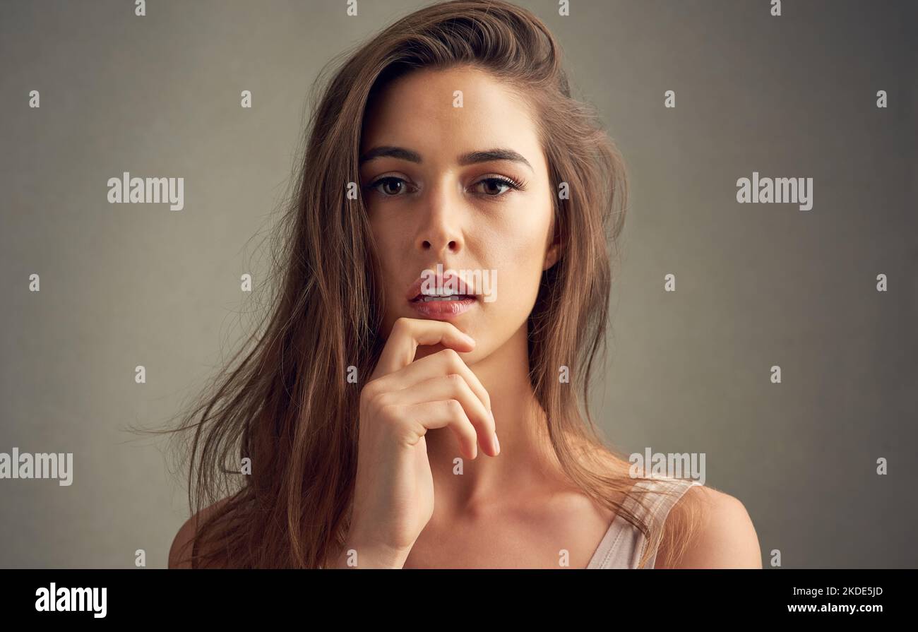 Her beauty is unrivalled. Studio portrait of an attractive young woman ...