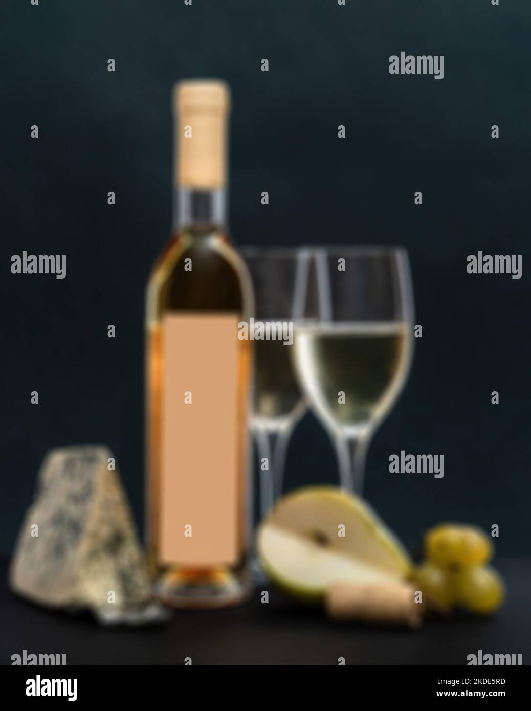 Abstract defocused blured background composition with glass and bottle ...