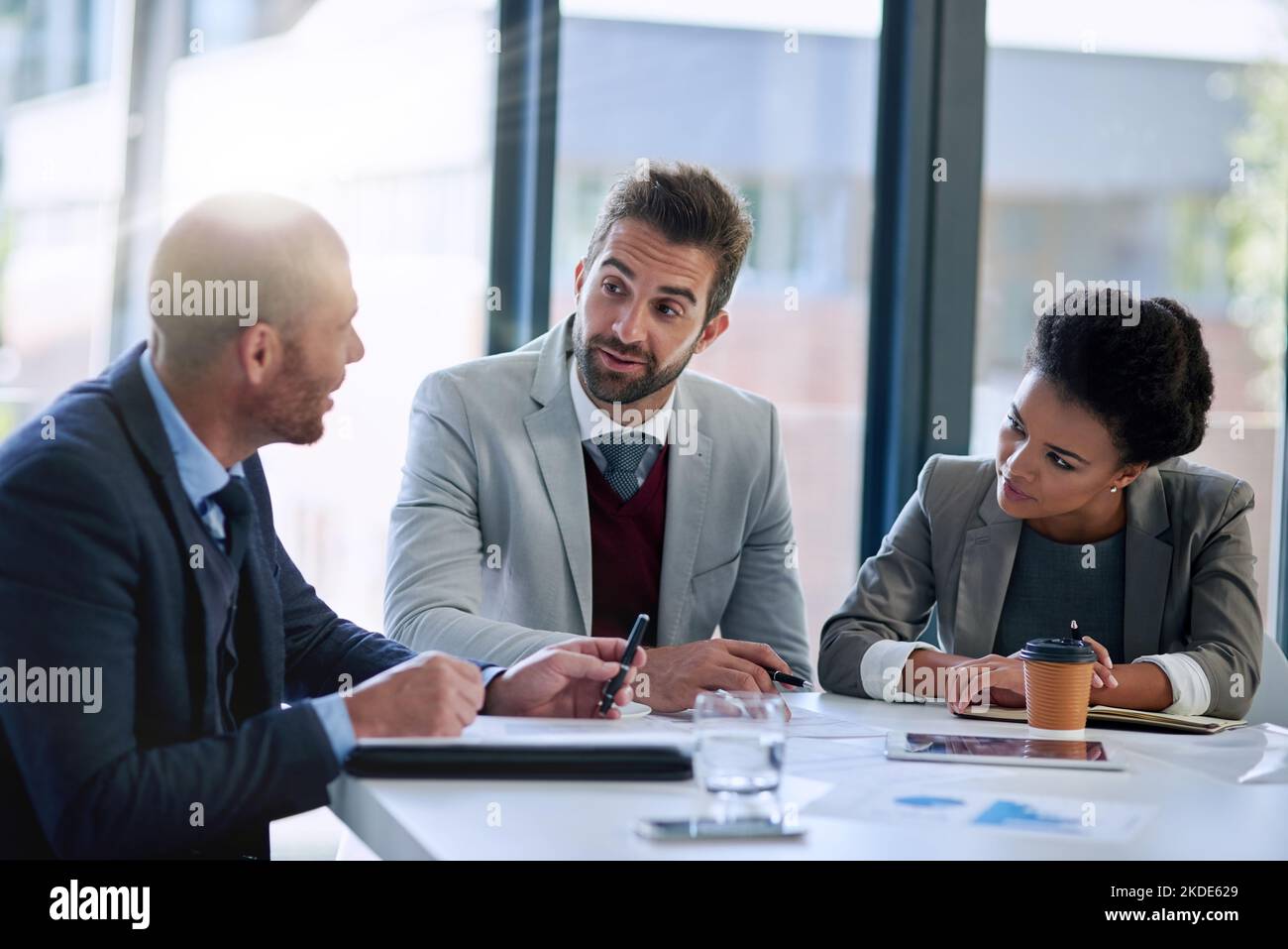 Setting down plans to increase their long-term profitability. a group ...