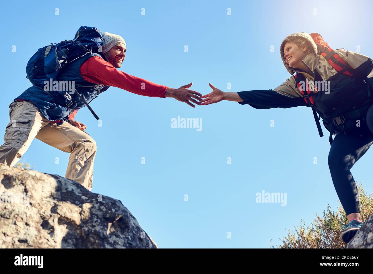Helping hands mountain climbing hi-res stock photography and images - Alamy