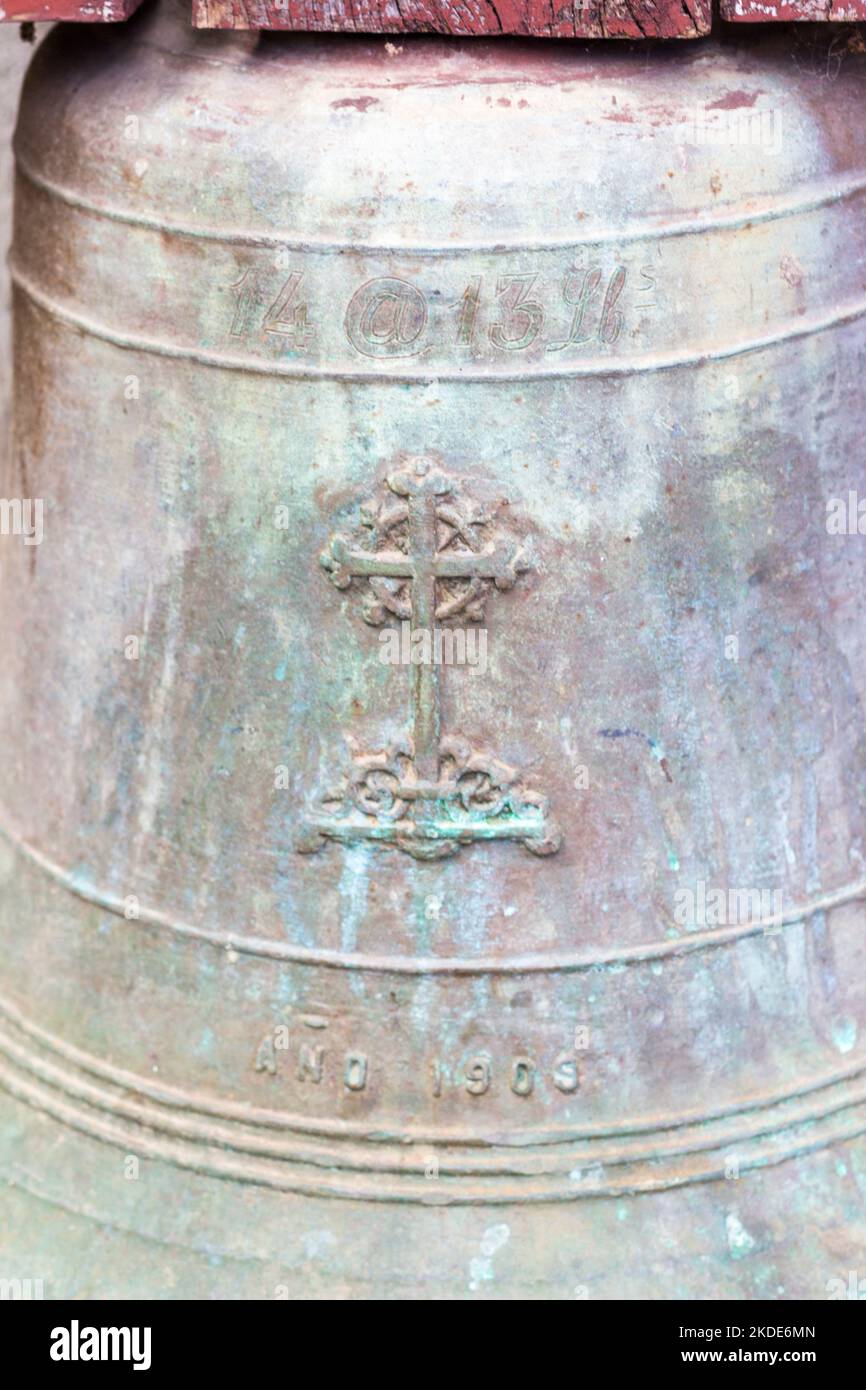 Cross bas relief of an old bell cast in 1909 from Catanduanes ...