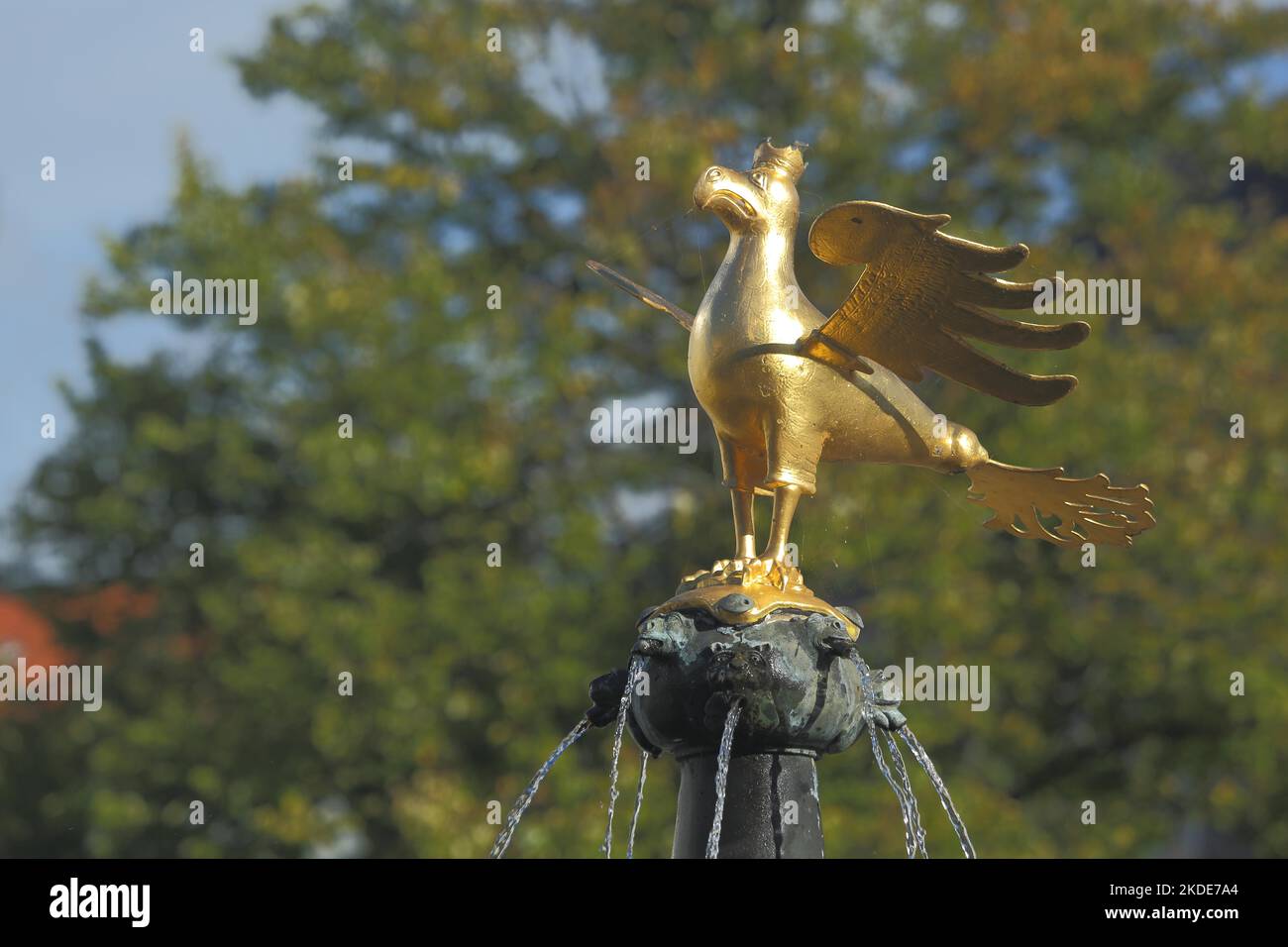 Golden heraldic animal with crown from the market fountain, eagle ...