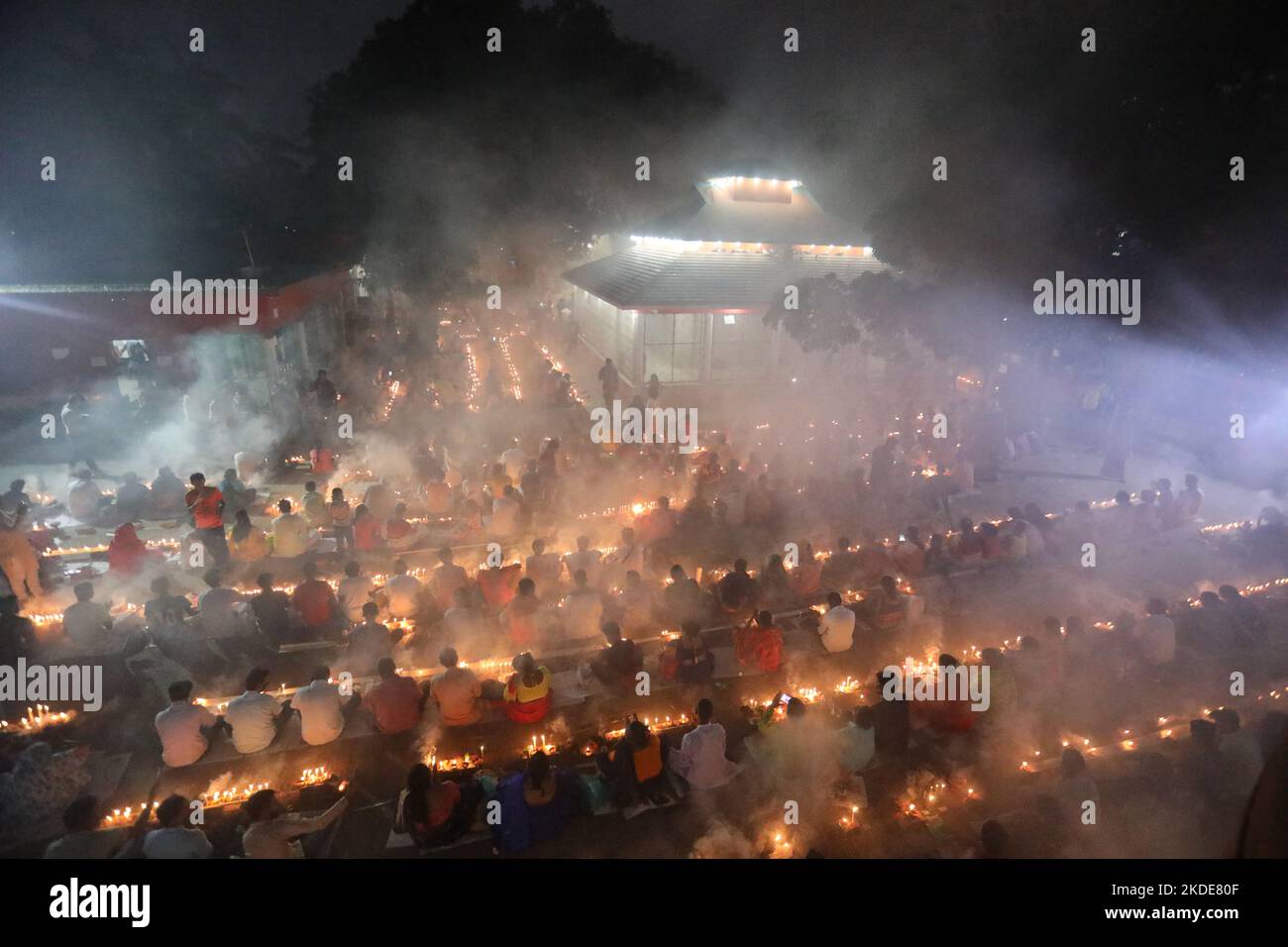 Aerial view of TThousands of Hindu devotees, sit with Prodip and pray ...