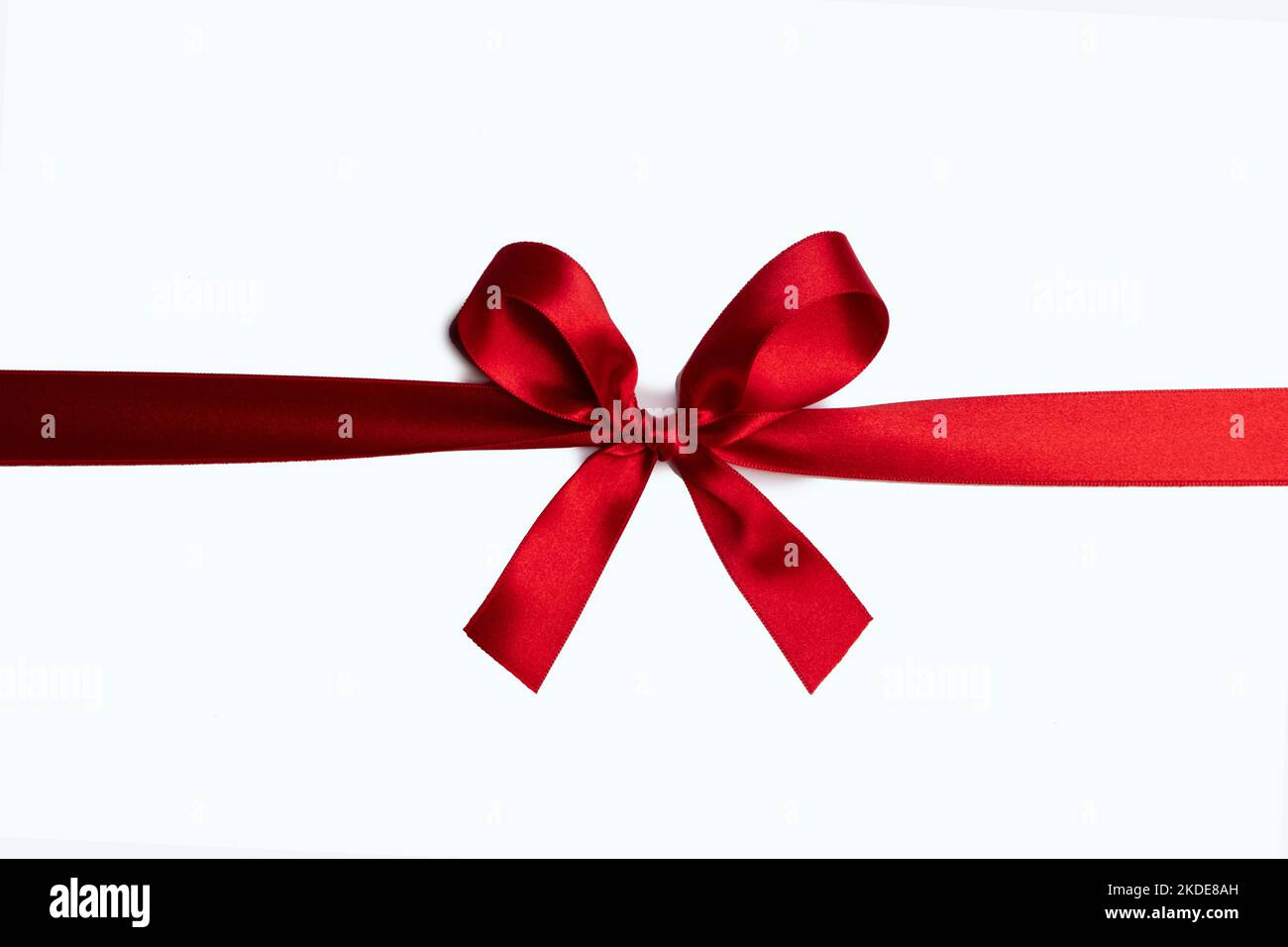 Elegant satin red ribbon bow isolated on white background Stock Photo ...