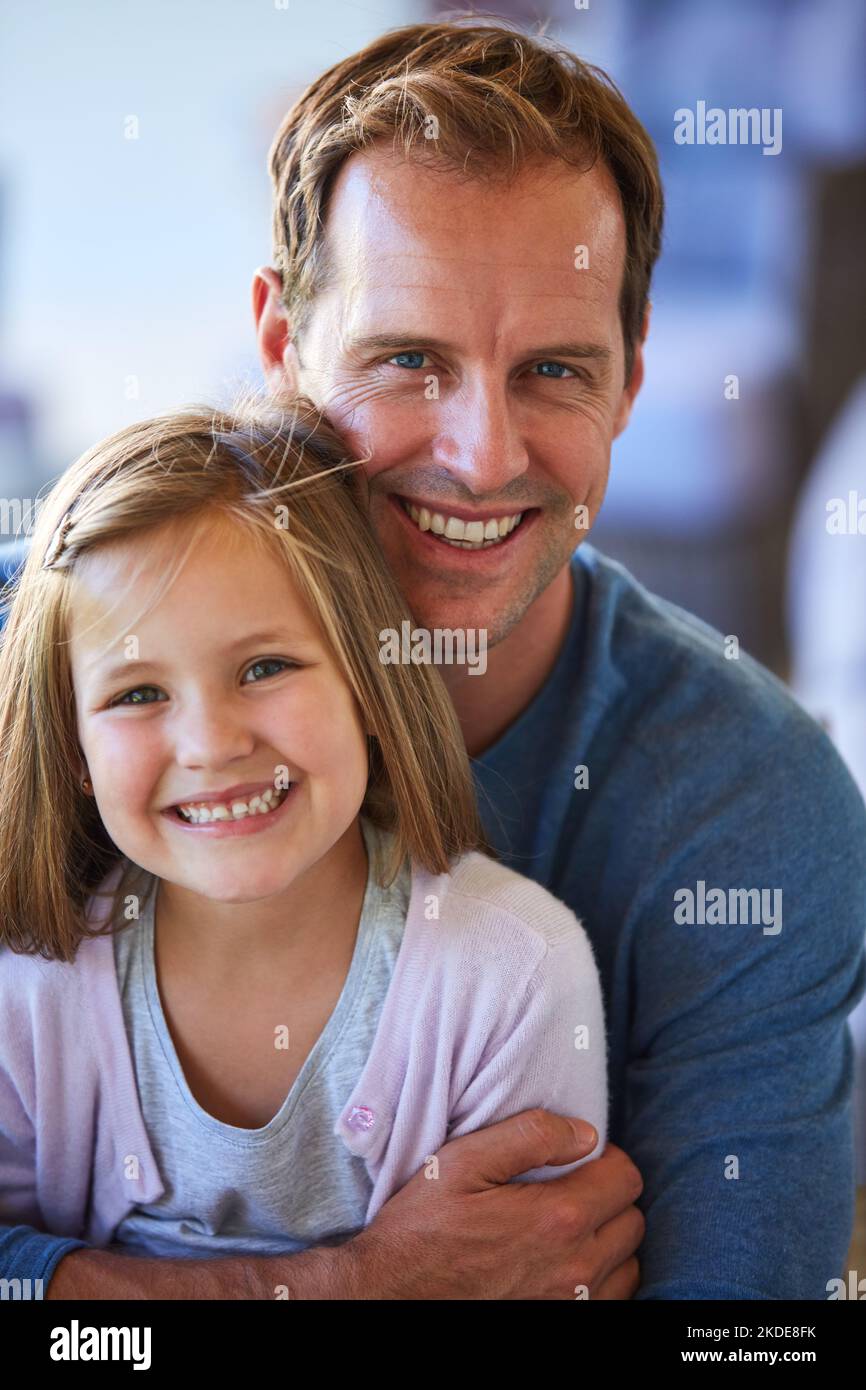 The love of family is one of the warmest feelings. Portrait of a father ...