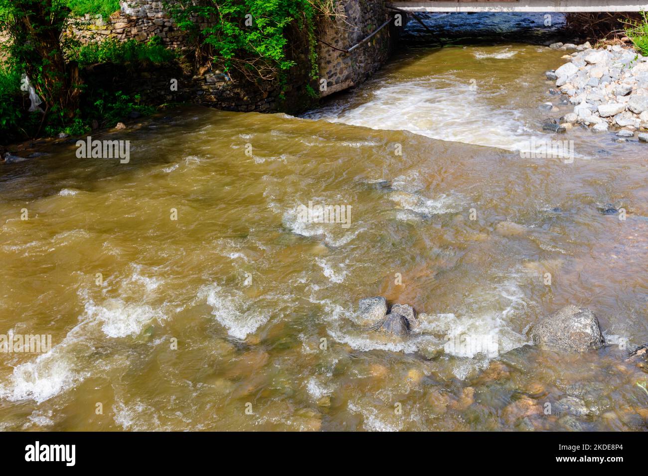 fast stream river from mountains in spring time Stock Photo - Alamy
