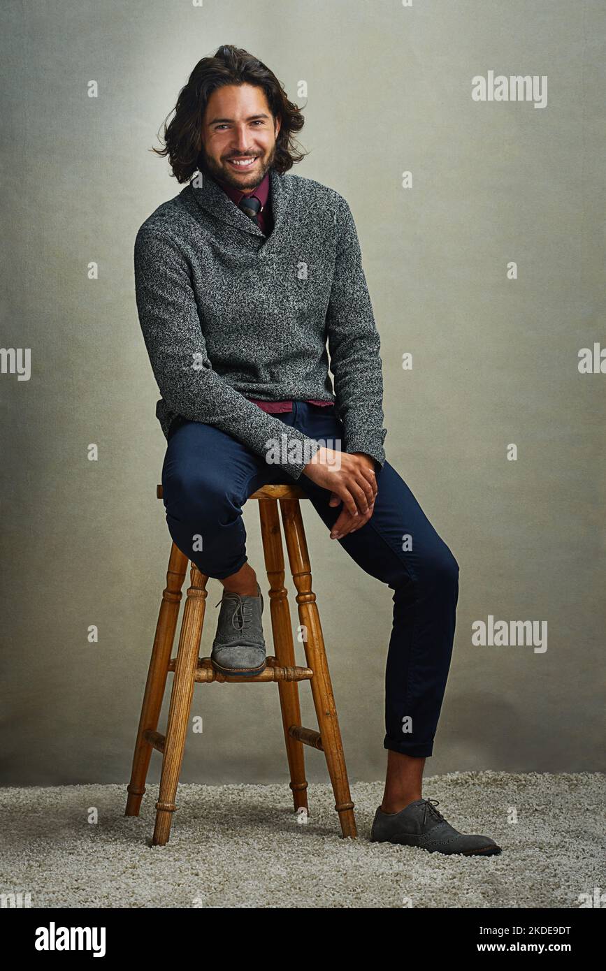 Positive stylish man sitting on hi-res stock photography and images - Alamy