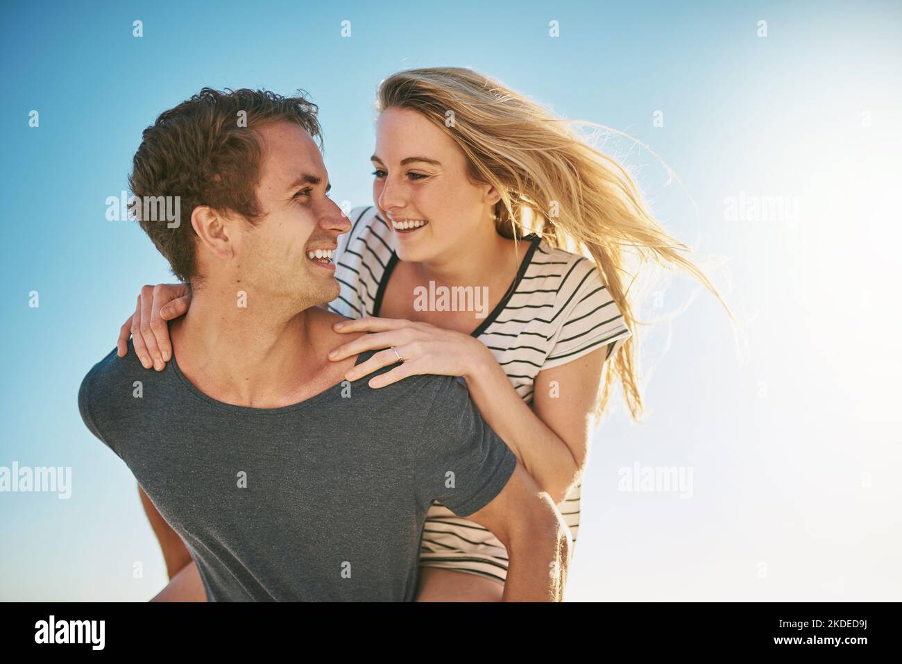 Living and loving all summer long. a happy young couple enjoying a ...