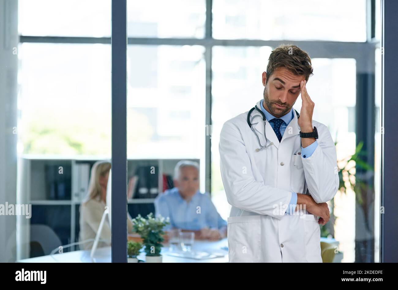 Hes got some upsetting news to share with his patients. a doctor ...
