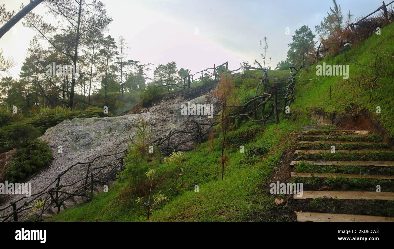 stairs, green grass and sulfur rocks in a tourist spot Stock Photo - Alamy