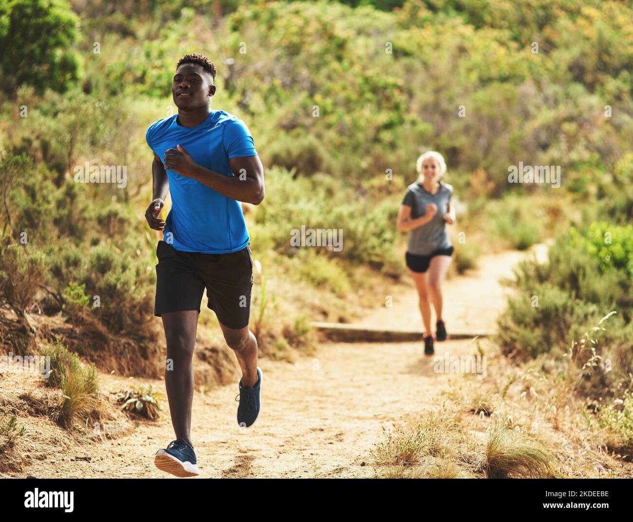 Dont stop even when you feel the burn. two sporty young people out for ...