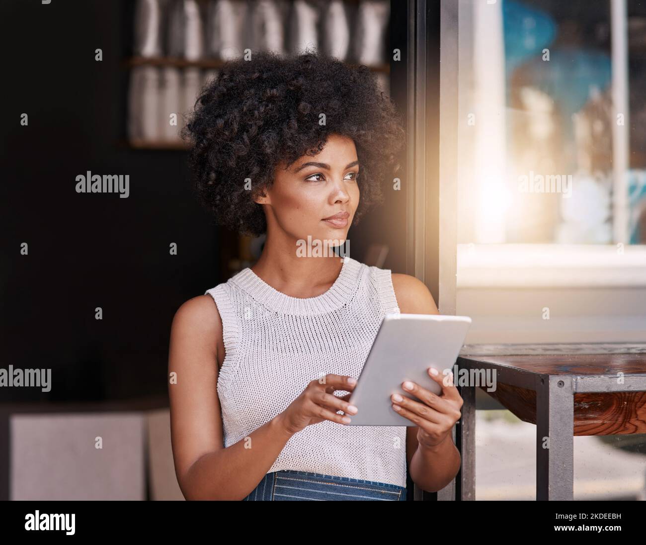 Female cafe owner thinking using hi-res stock photography and images ...