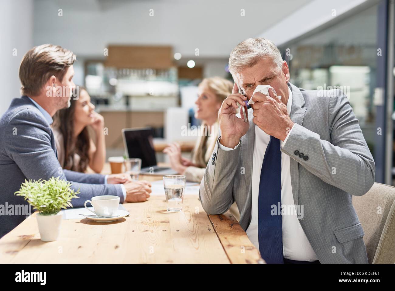 Doctor talking on smartphone in hi-res stock photography and images - Alamy