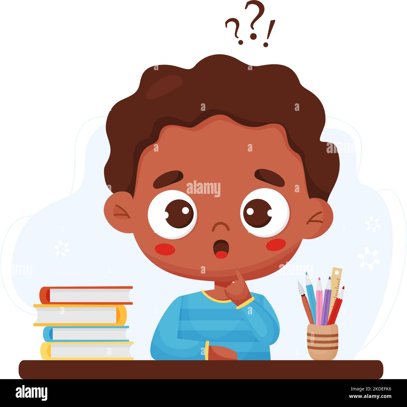 Surprised thoughtful black boy at table with books and stationery ...