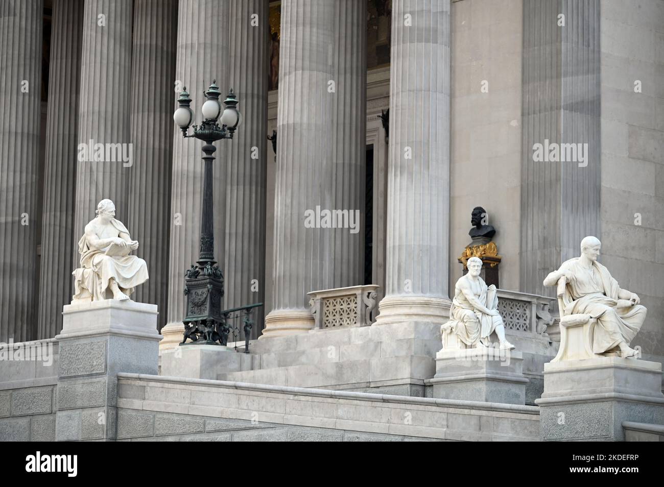 statues in front of the Austrian parliament Stock Photo - Alamy