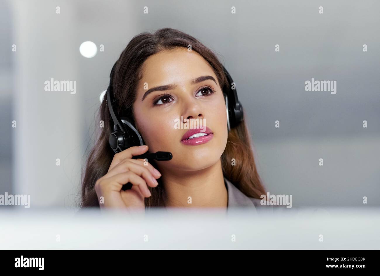 Shes got a way to resolve every customers request. a young call centre ...