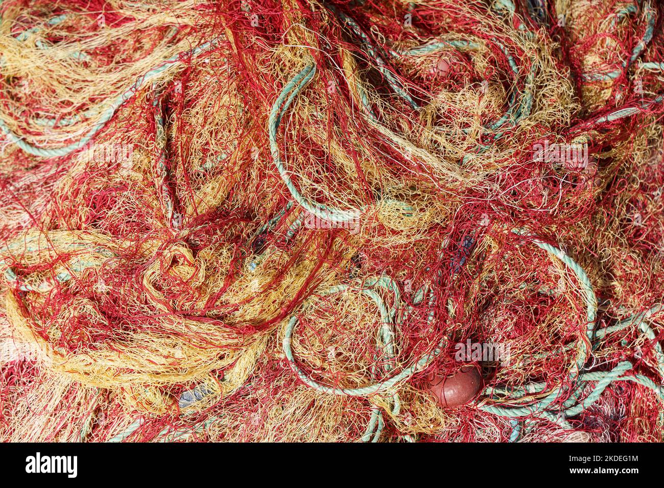 Fishing nets close up abstract background. Nylon fishing nets on a boat ...