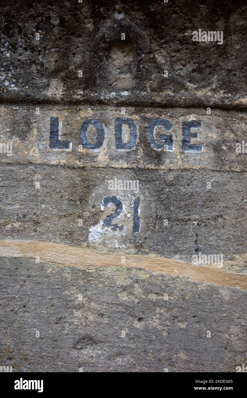 Number 21 house number on a stone wall Stock Photo - Alamy