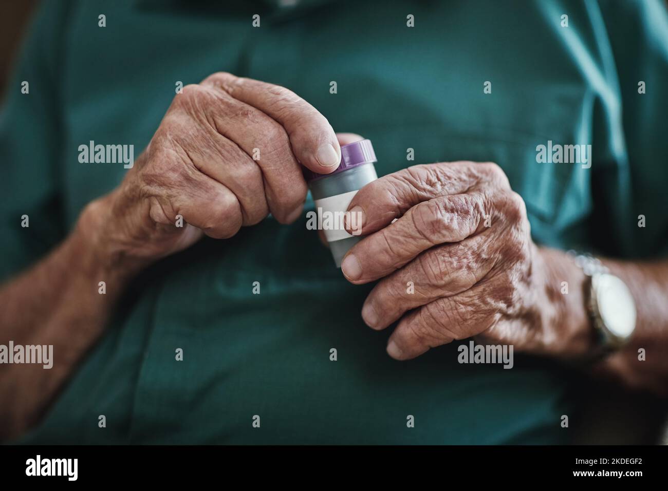 Time for my daily boost. a senior man about to take his medication ...