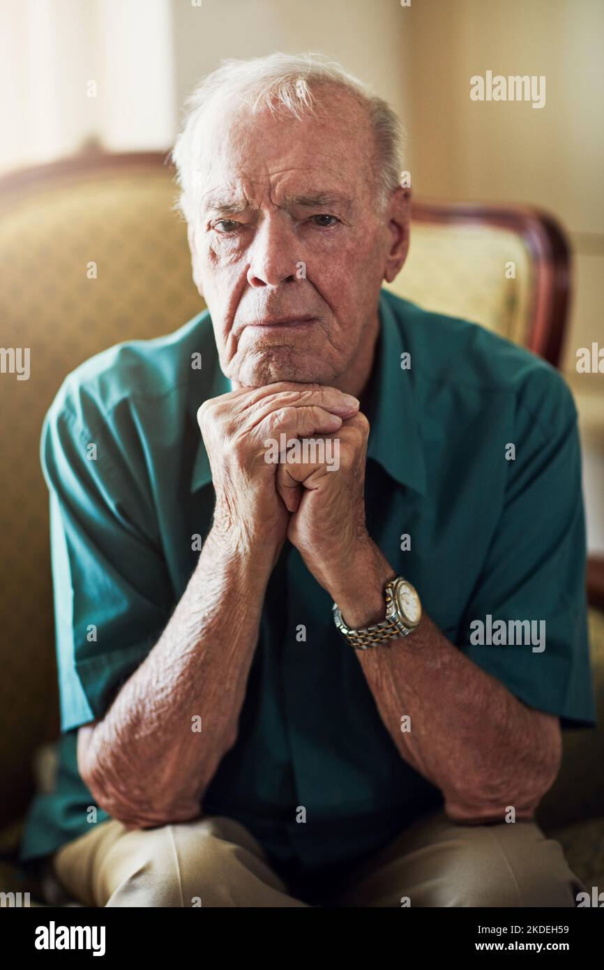 Grumpy old man sitting in hi-res stock photography and images - Alamy
