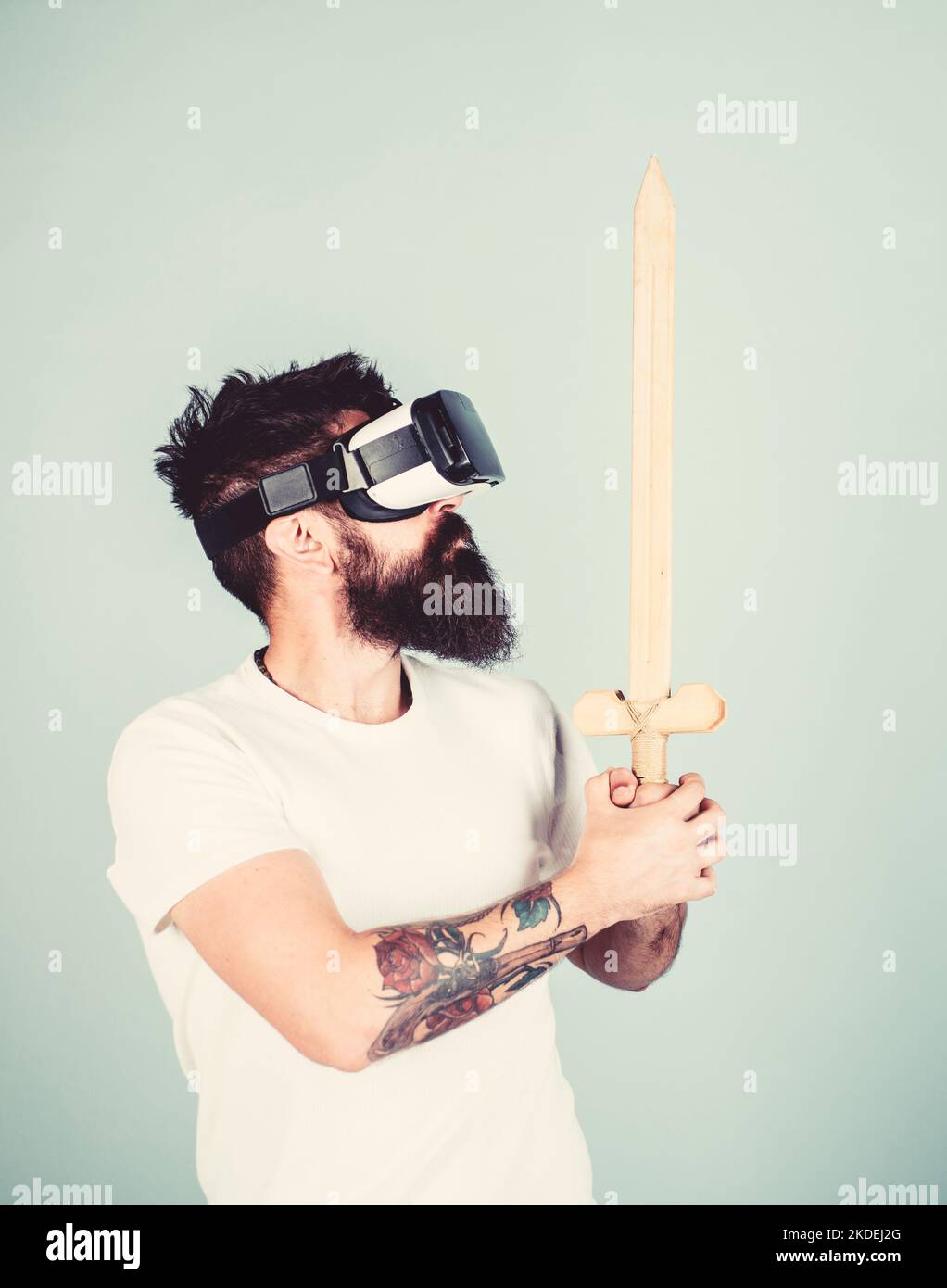 Hipster on serious face enjoy play game in virtual reality. Gamer ...