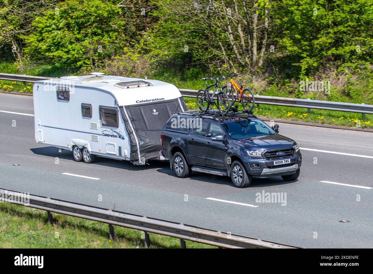 Ace Celebration twin-axle touring caravan travelling on the M6 Motorway ...