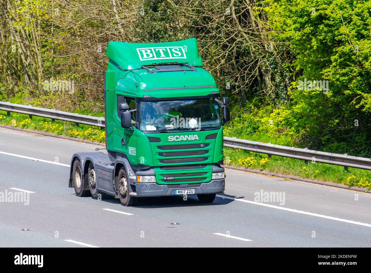 BTS Green Scania R 450 Powertrain cab travelling on the M6 Motorway UK ...