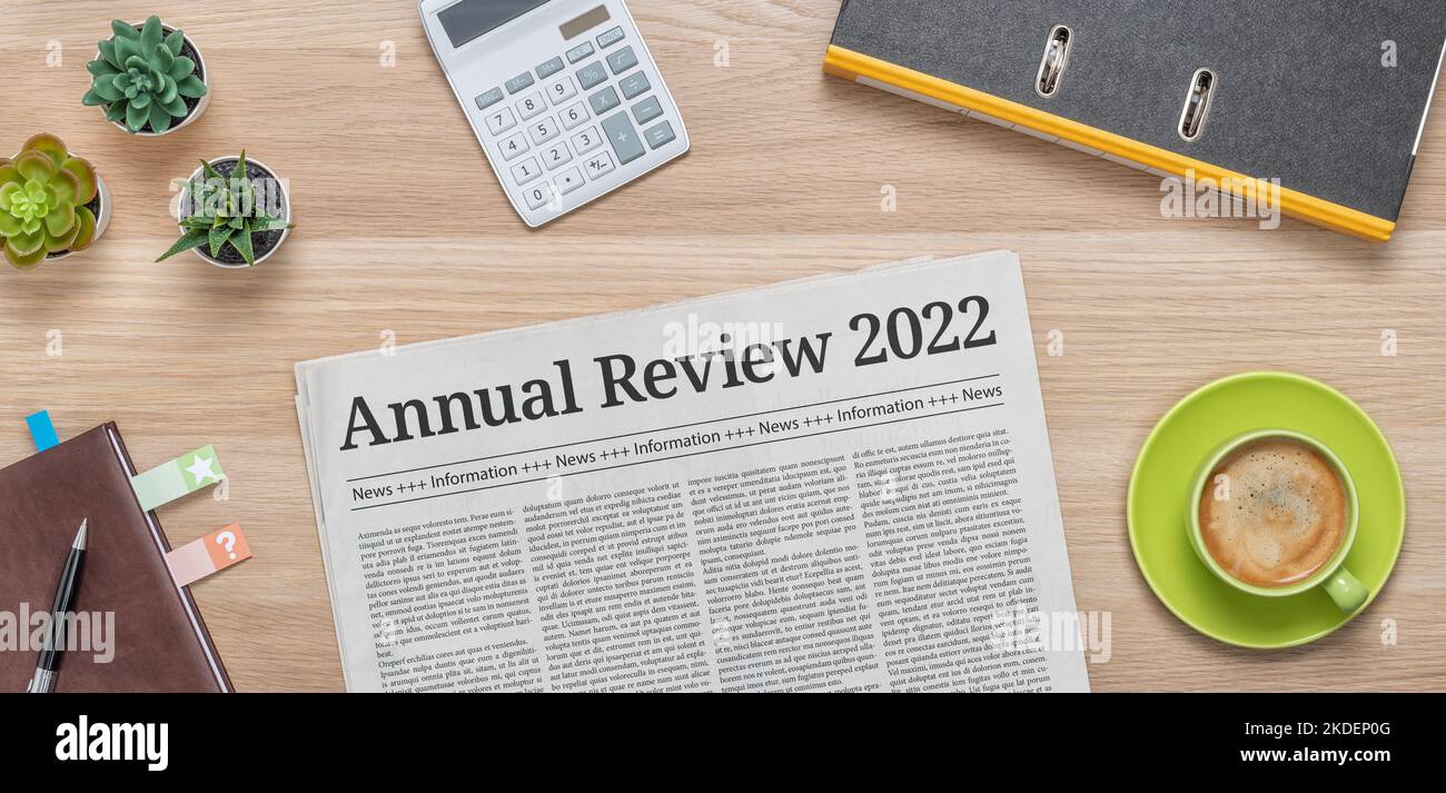 A newspaper on a desk with the headline Annual review 2022 Stock Photo ...