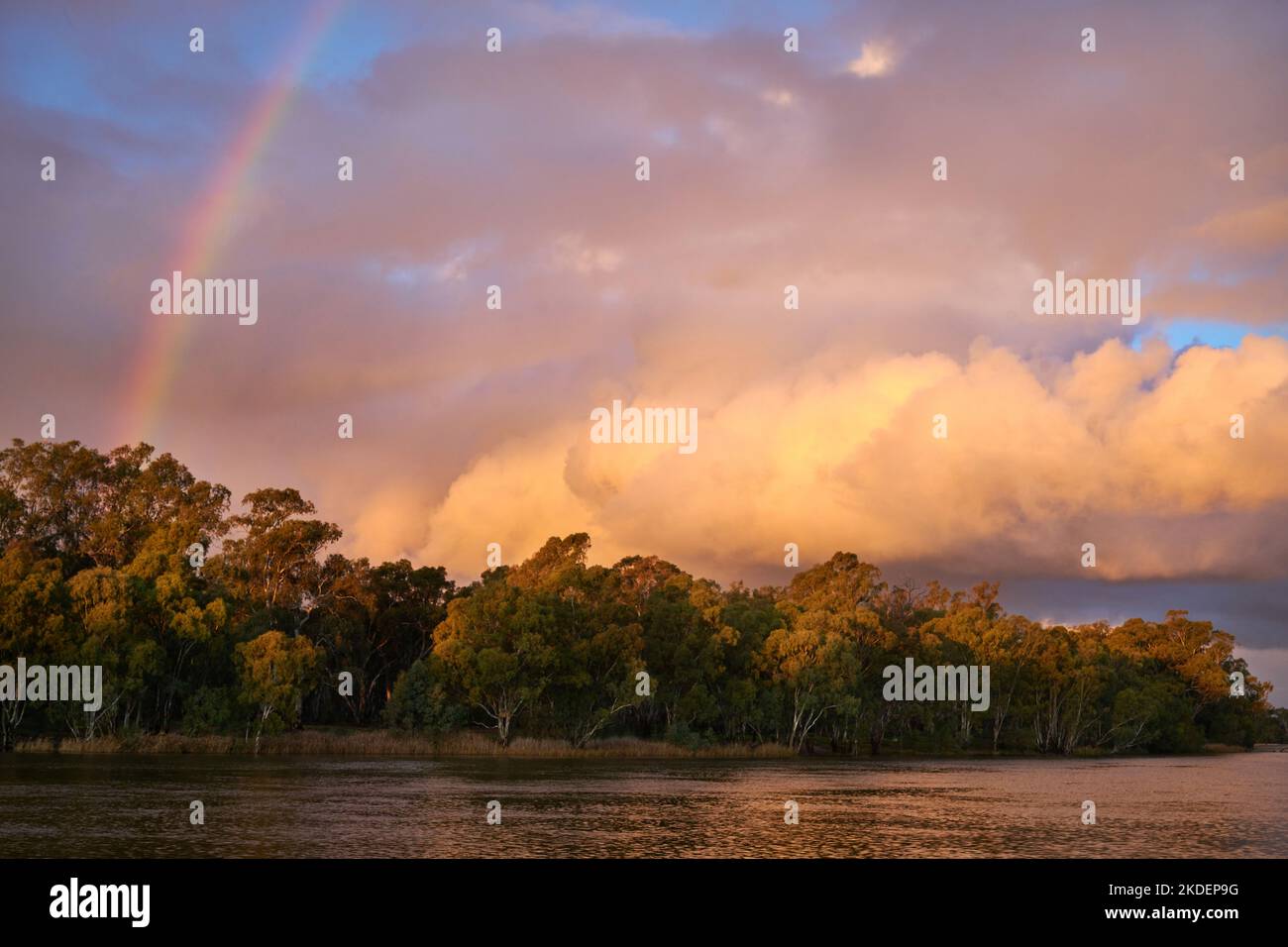 Snapshot of rainbow, storm clouds over Murray River between Mildura and ...