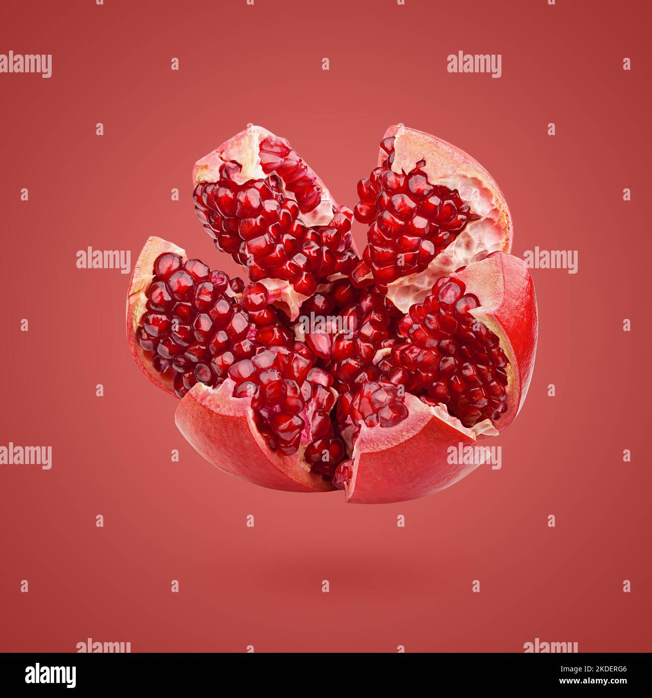 pomegranate on red color background, Minimal creative food concept ...