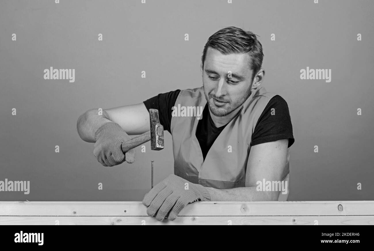 Handyman concept. Man, handyman in working uniform and protective ...