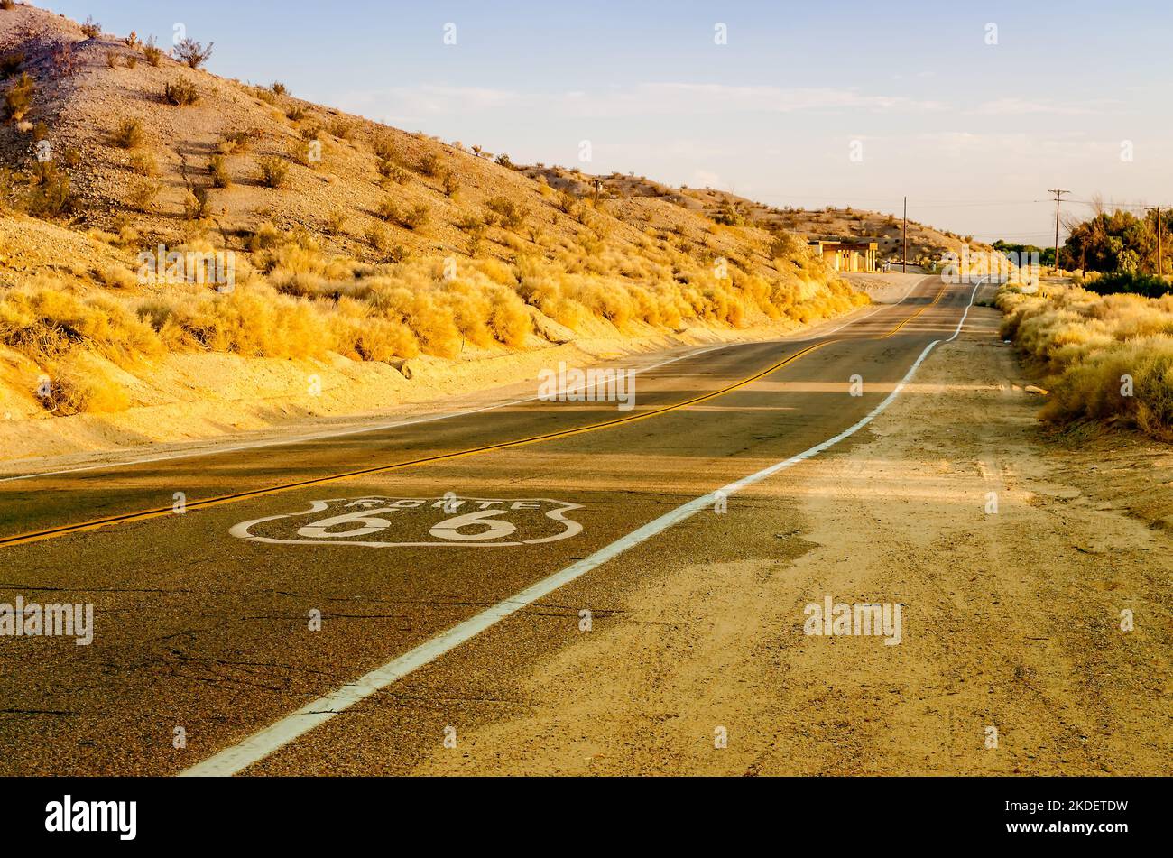 Historic Route 66, with pavement sign in California, USA. Route 66 is ...