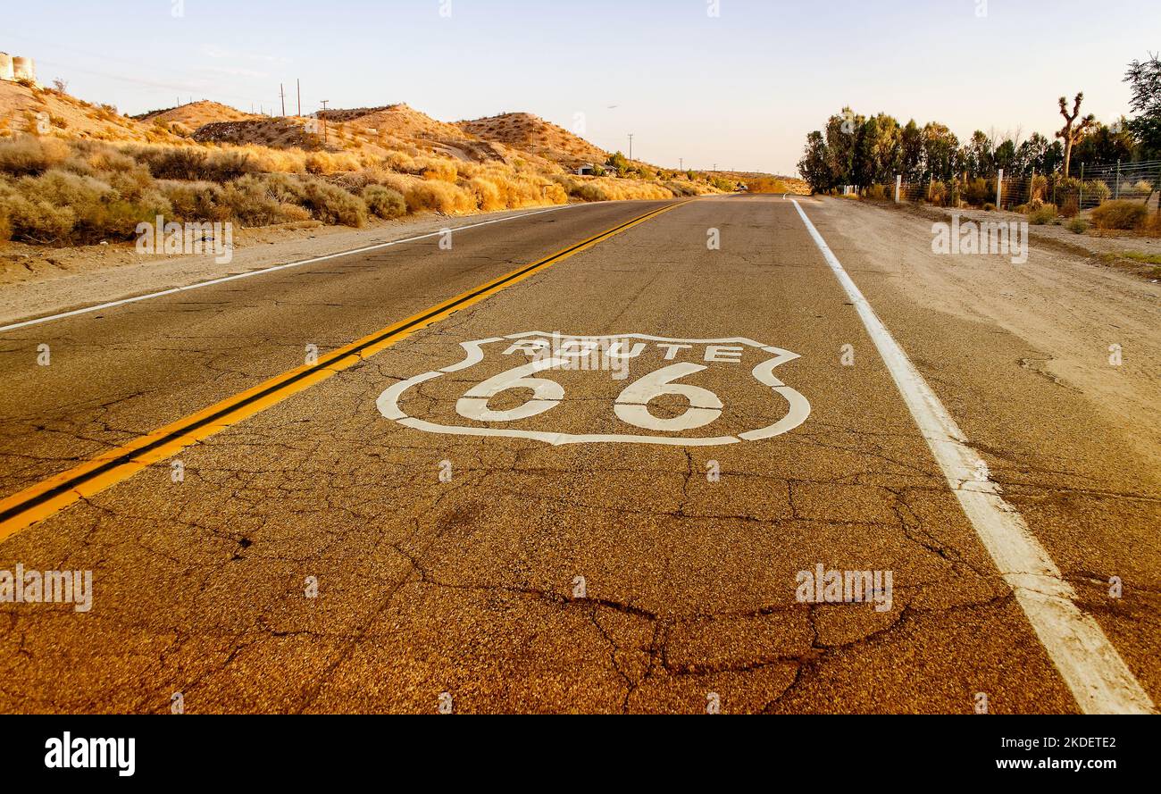Historic Route 66, with pavement sign in California, USA. Route 66 is ...