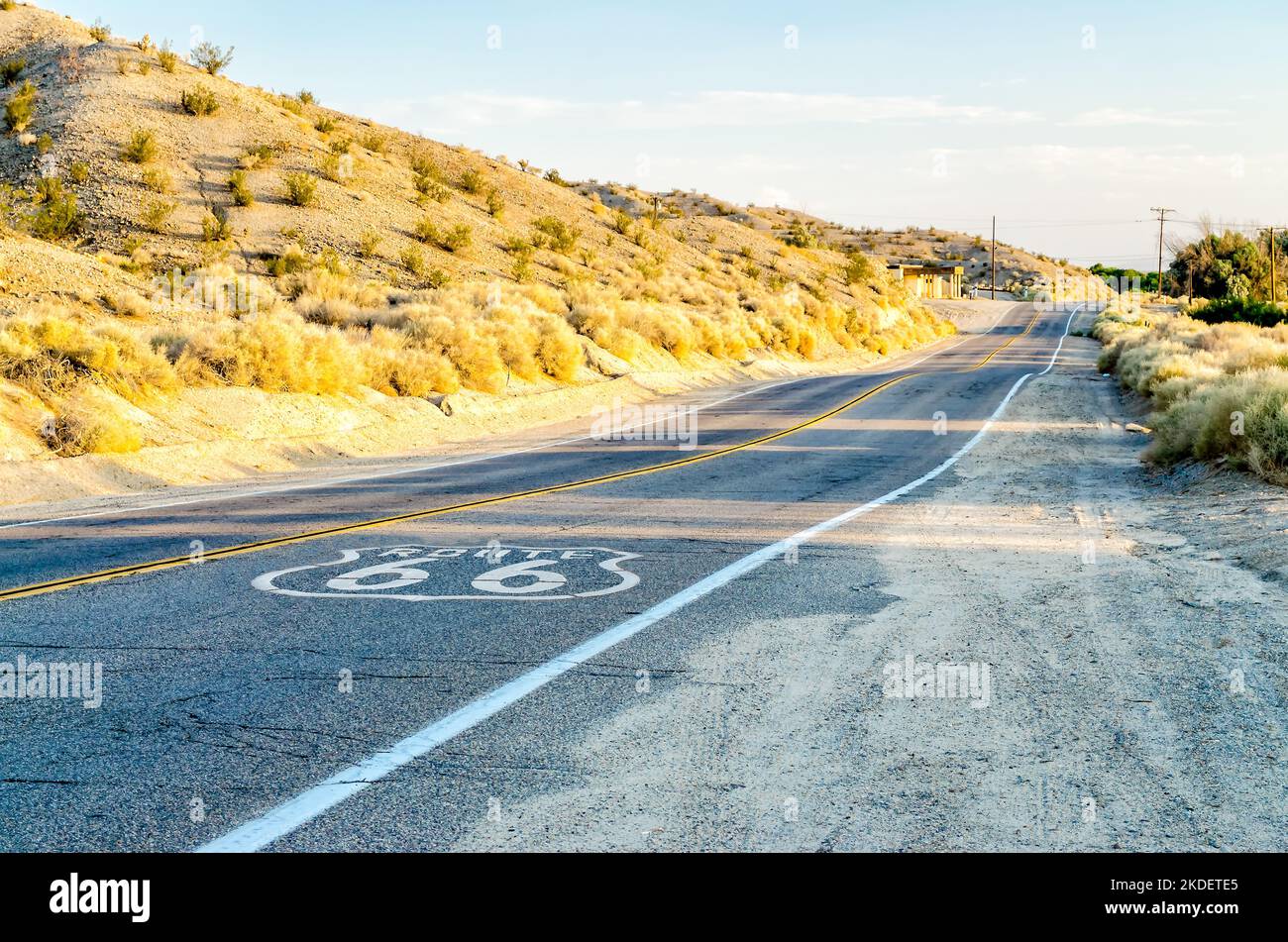 Historic Route 66, with pavement sign in California, USA. Route 66 is ...