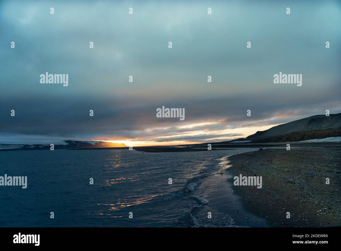 Sun setting North Sea Arctic Landscape, Longyearbyen, Svalbard, Norway ...